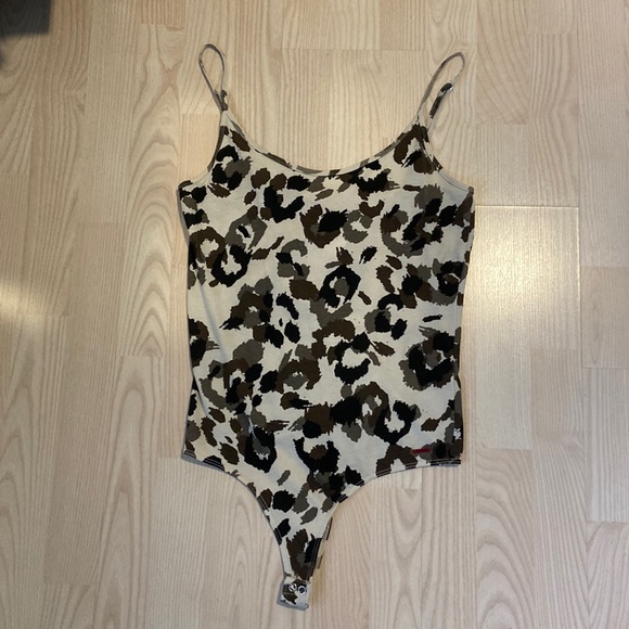 Planet Blue | Tops | Nwt Adorable Animal Print Bodysuit | Poshmark